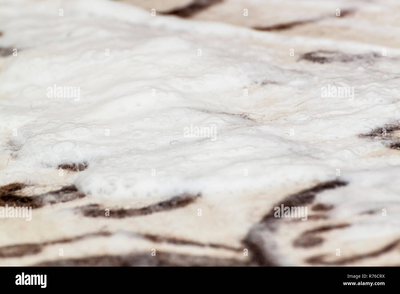 Old fashioned wool felting using only soap and water Stock Photo - Alamy