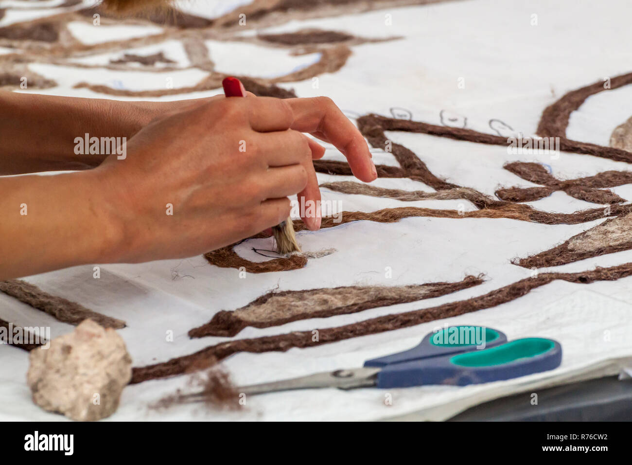 Old fashioned wool felting using only soap and water Stock Photo - Alamy