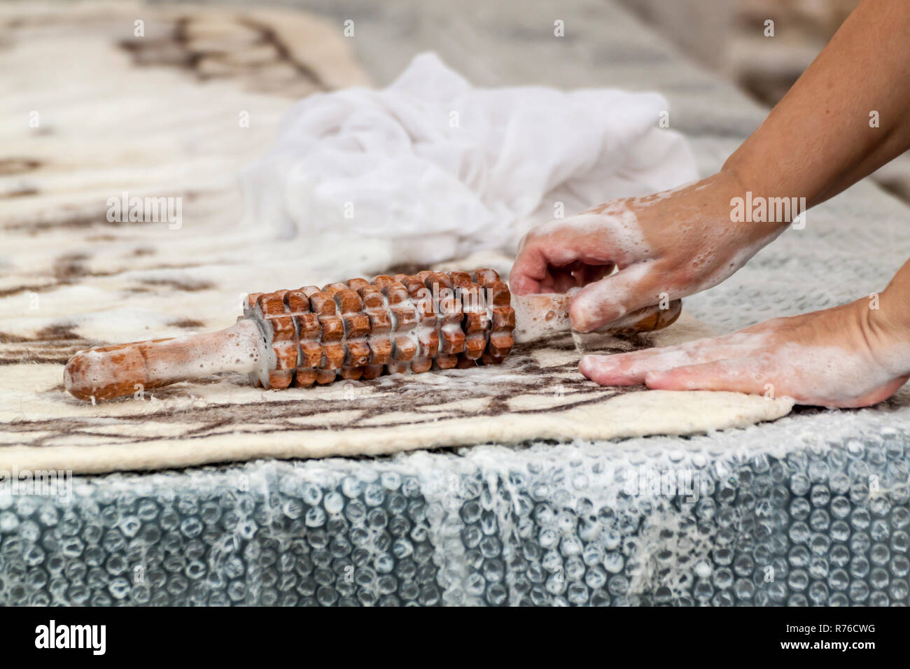 Old fashioned wool felting using only soap and water Stock Photo - Alamy
