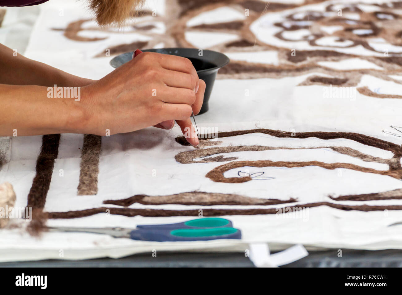 Old fashioned wool felting using only soap and water Stock Photo - Alamy