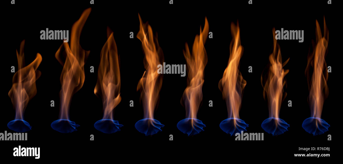 Blue and yellow colored flames isolated on black background Stock Photo ...