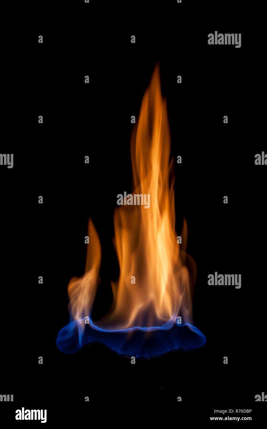 Blue and yellow colored flames isolated on black background Stock Photo ...