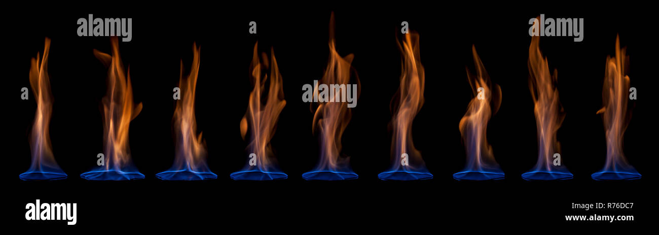 Blue and yellow colored flames isolated on black background Stock Photo ...