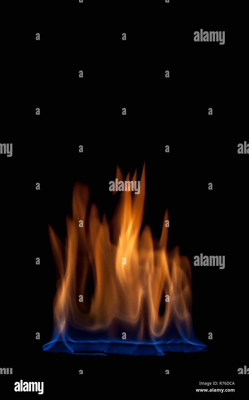 Blue and yellow colored flames isolated on black background Stock Photo ...