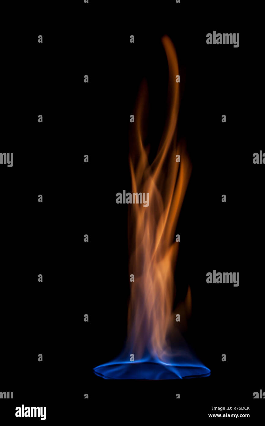 Blue and yellow colored flames isolated on black background Stock Photo ...