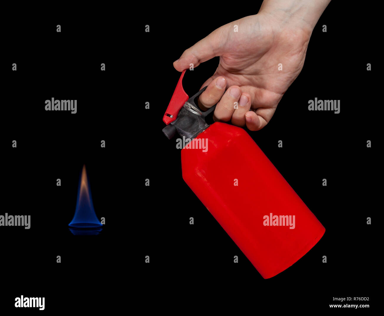 Hand holding fire extinguisher hi-res stock photography and images - Alamy