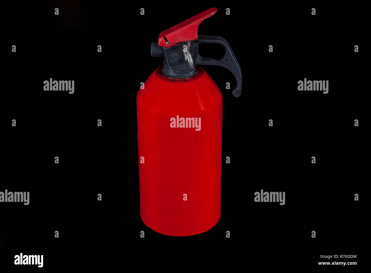 Small and mobile fire extinguisher isolated on black background Stock ...