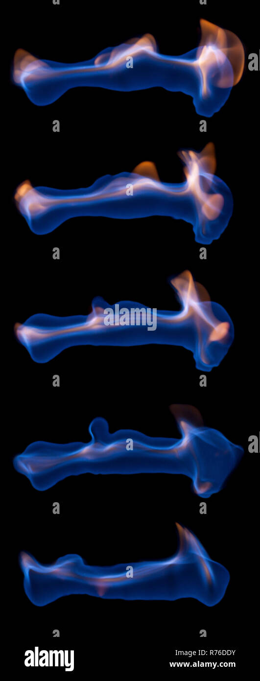 Blue and yellow colored flames isolated on black background Stock Photo ...