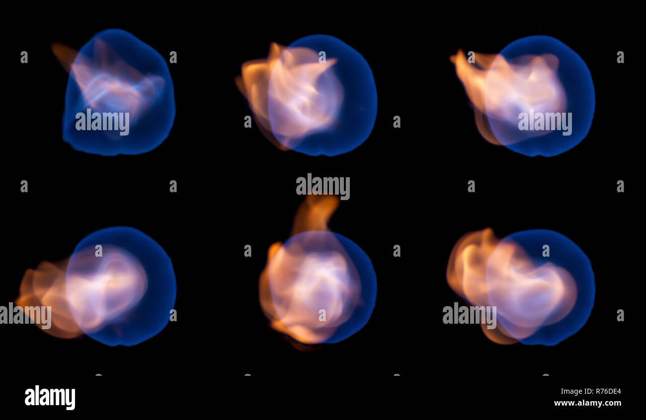 Blue and yellow colored flames isolated on black background Stock Photo ...