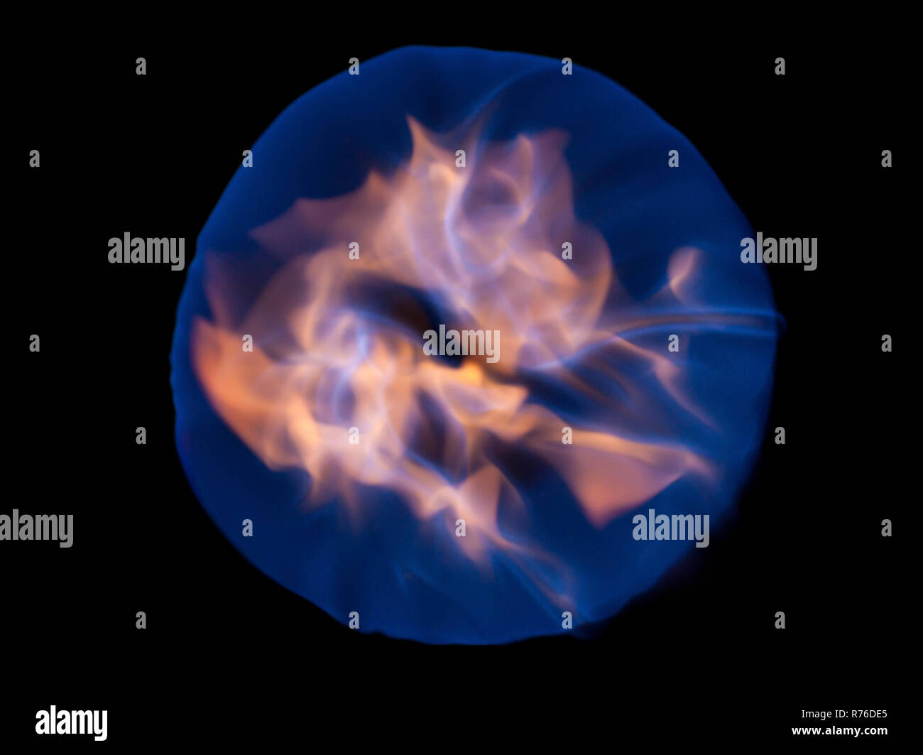 Fireball with blue flames isolated on black background Stock Photo - Alamy