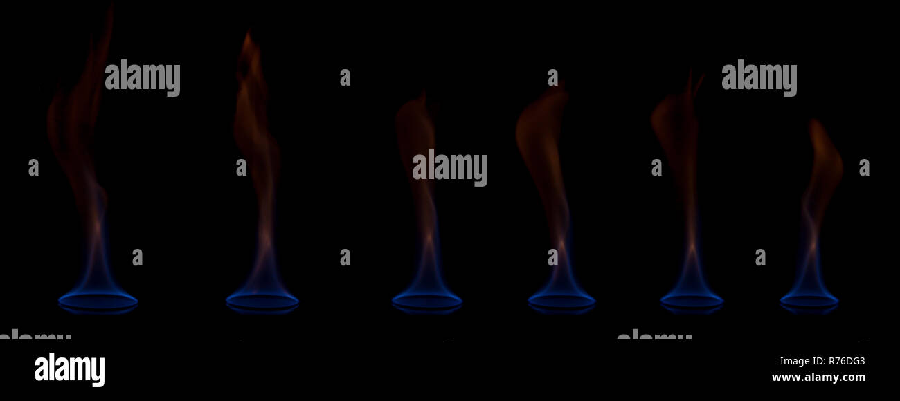 Blue and yellow colored flames isolated on black background Stock Photo ...