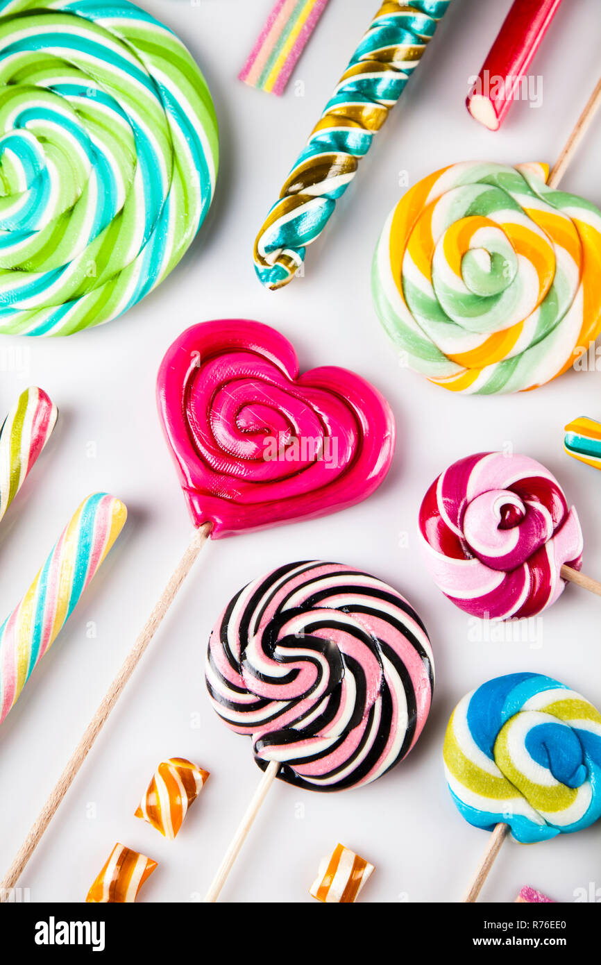 Colorful gum sweet candy and lollipops and gum balls Stock Photo - Alamy