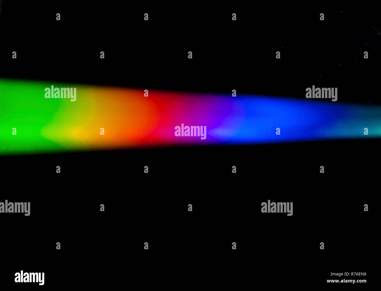 Rainbow colored laser light Stock Photo - Alamy