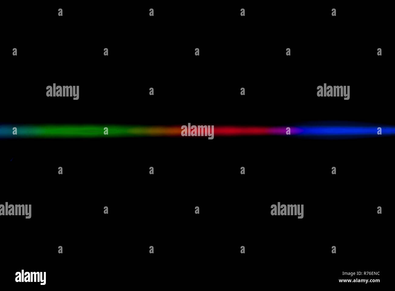 Rainbow colored laser light Stock Photo - Alamy