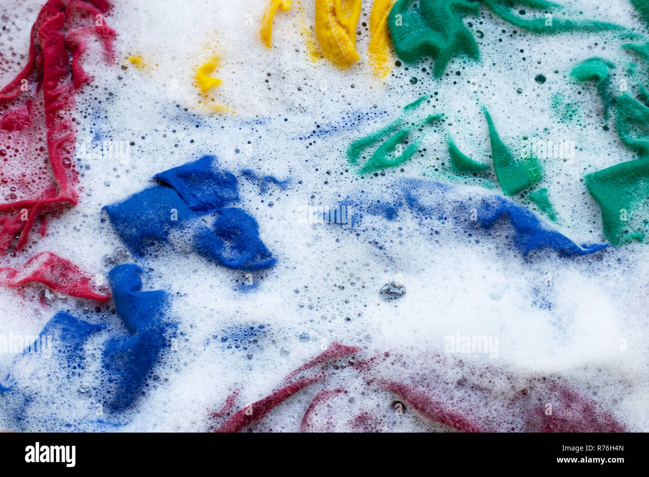 Washing clothes, colorful clothes soaked Stock Photo - Alamy