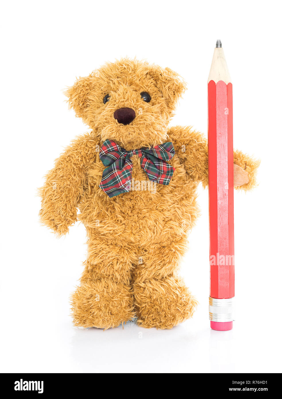 Teddy bear with red pencil Stock Photo - Alamy