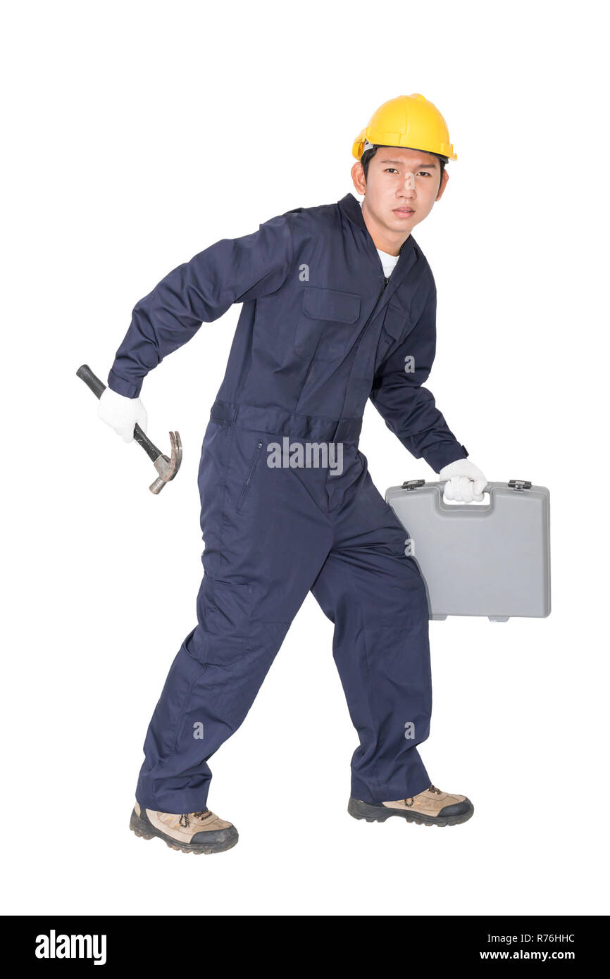 Young handyman standing with his tool box Stock Photo - Alamy