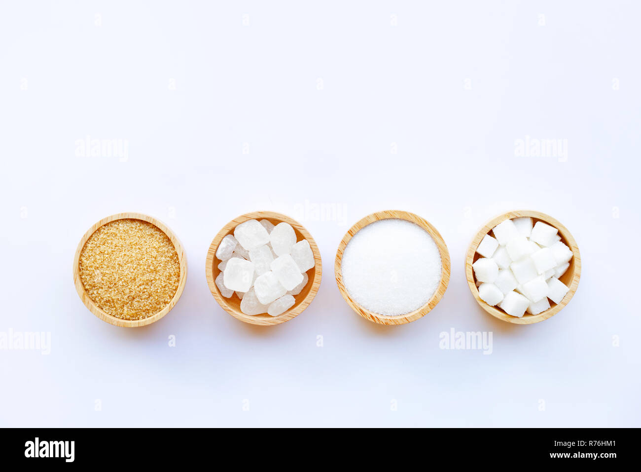 Various types of sugar on white background Stock Photo - Alamy