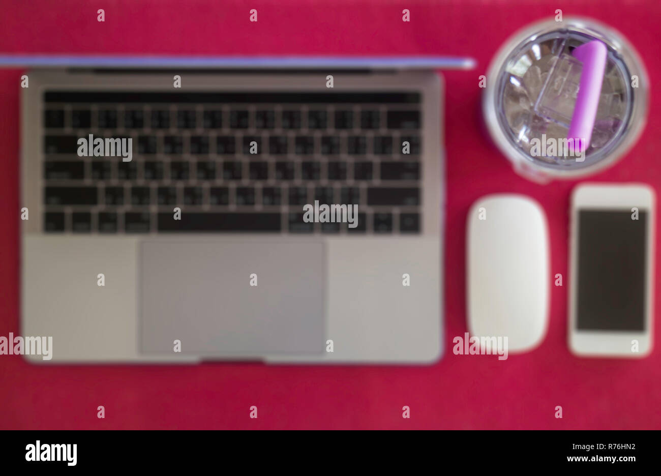 Simple wireless work table with mobile gadget and drink Stock Photo - Alamy