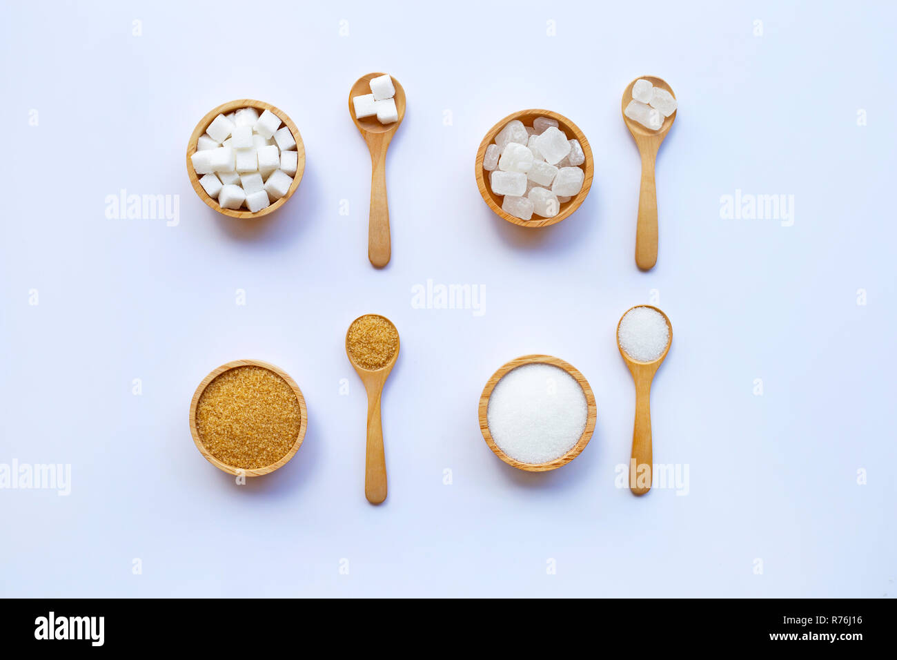 Various types of sugar on white background Stock Photo - Alamy