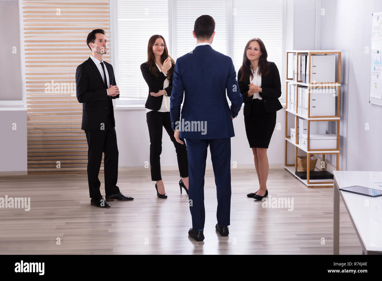 Manager With His Colleague Having Discussion Stock Photo - Alamy