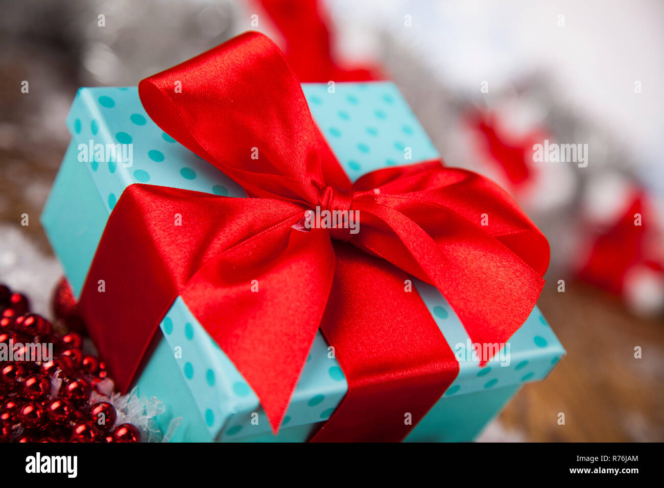 Christmas gift box, red ribbon Stock Photo - Alamy