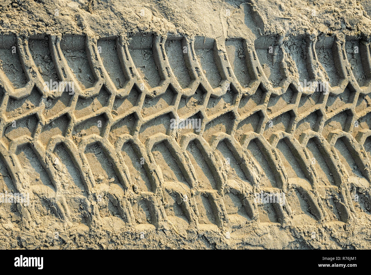 Car tyre tracks prints on sandy beach Stock Photo - Alamy