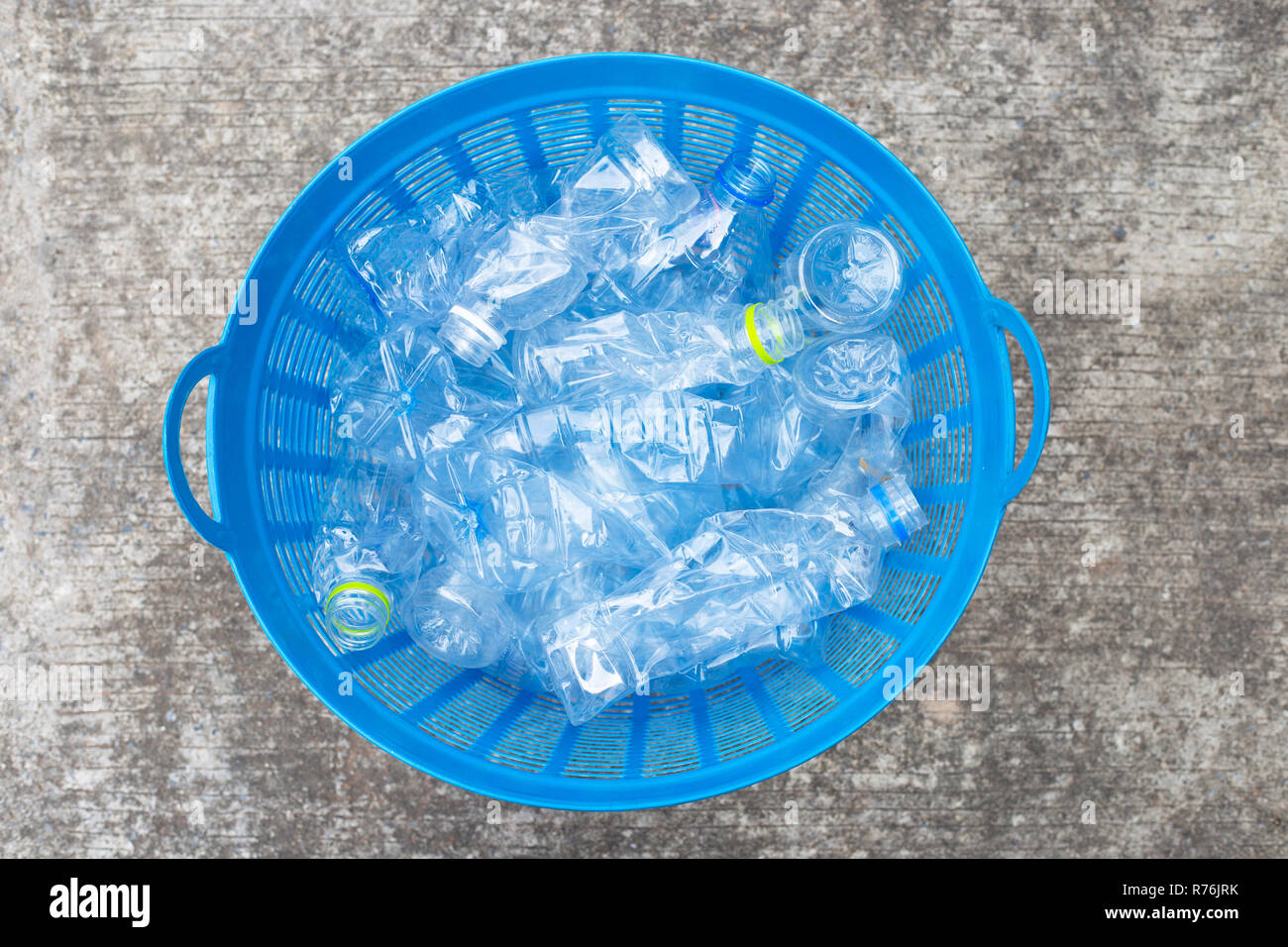 Plastic bottles in waste basket Stock Photo - Alamy