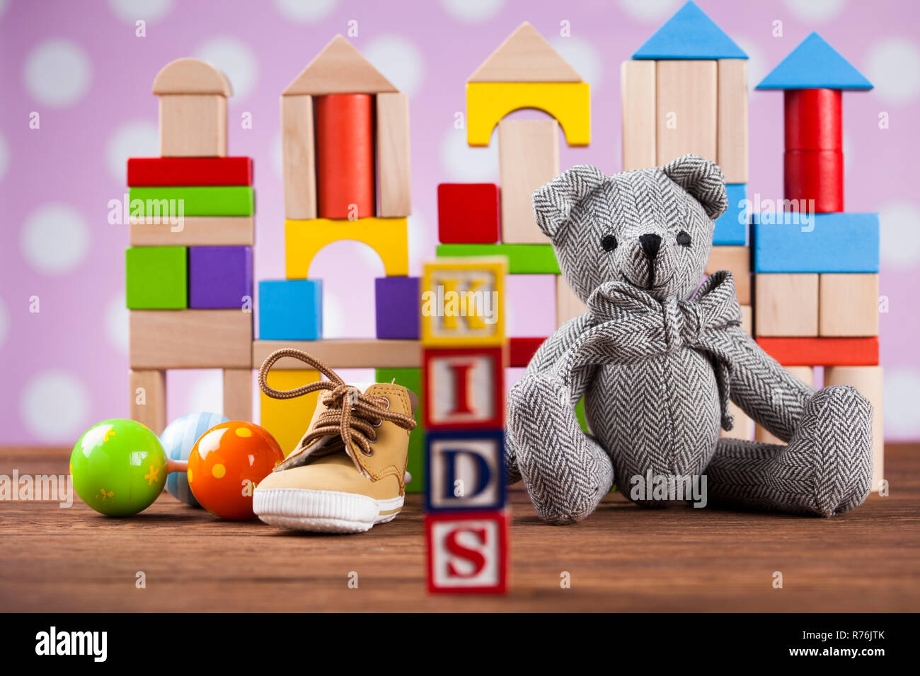 Baby World toy collection on on wooden background Stock Photo - Alamy
