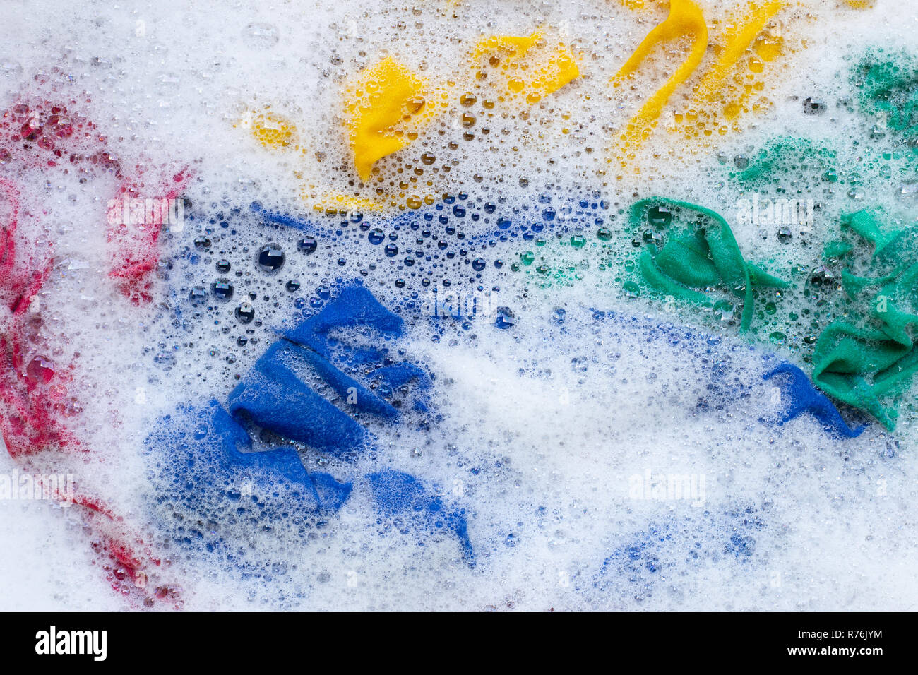 Washing clothes, colorful clothes soaked Stock Photo - Alamy