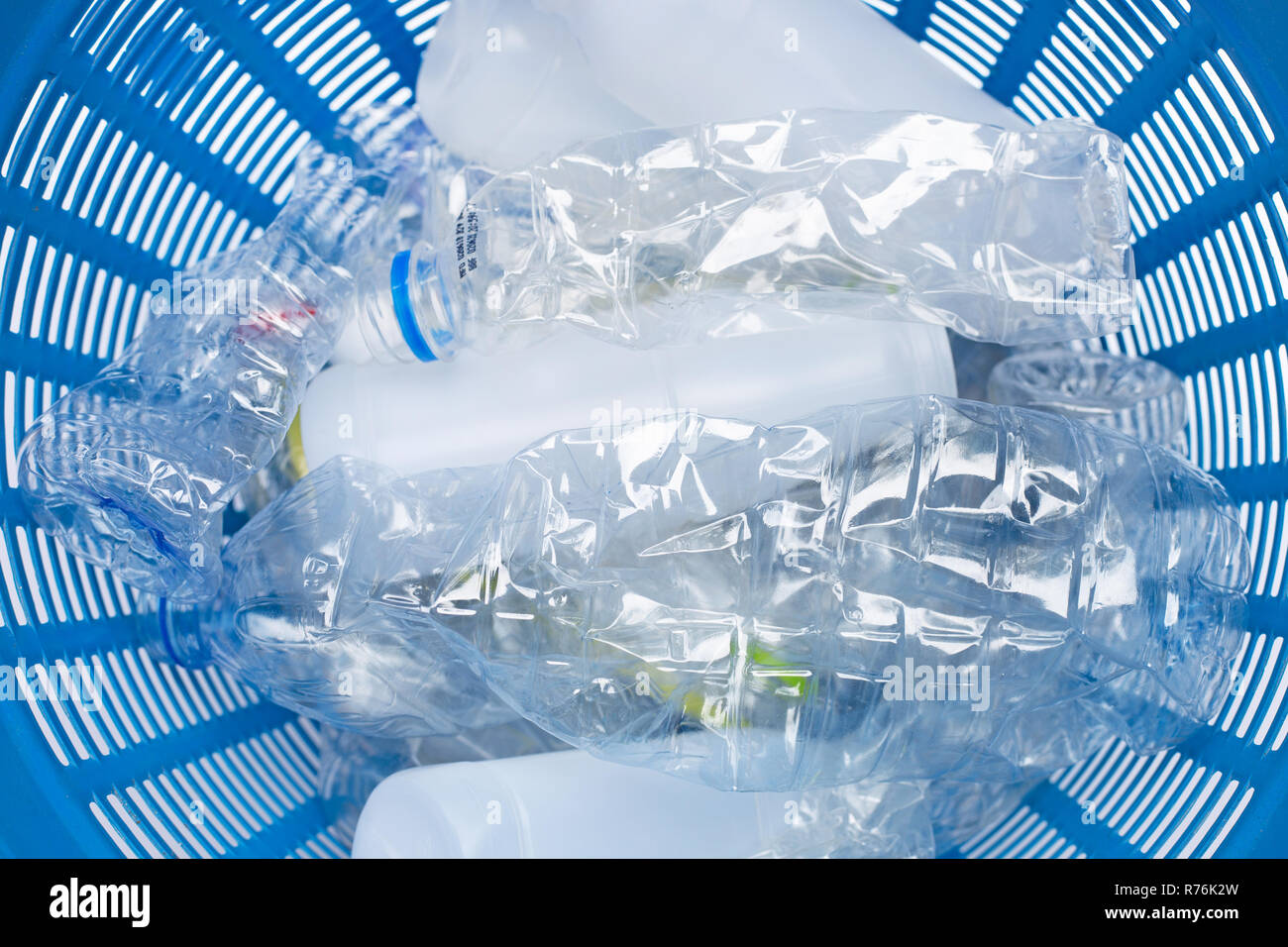 Plastic bottles in waste basket Stock Photo - Alamy