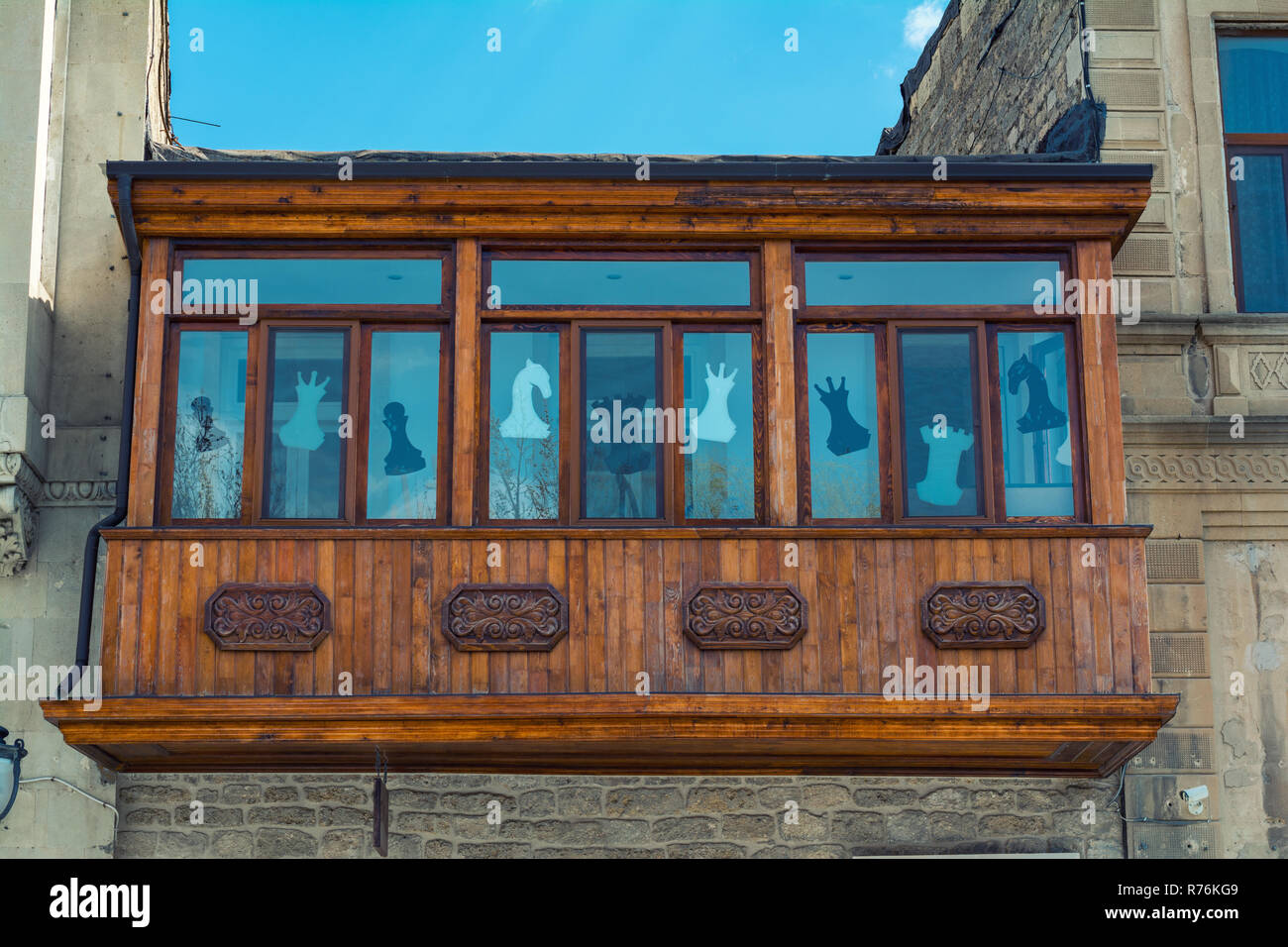 Old wooden balcony in old town Stock Photo - Alamy
