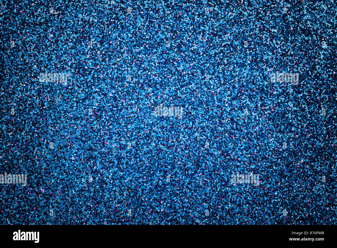 Navy blue sparkling background from small sequins, closeup. Brilliant ...