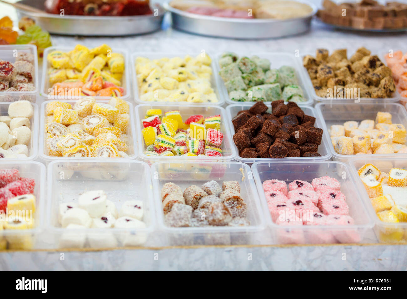 Sweet display on a market Stock Photo - Alamy