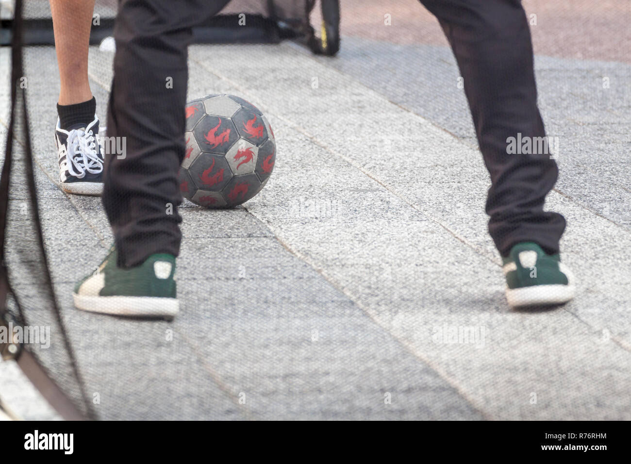 Panna - new urban game where the players should kick the ball between ...