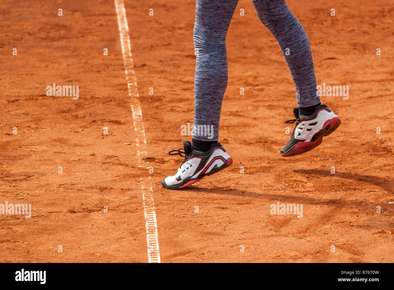 Tennis player serving on clay hi-res stock photography and images - Alamy