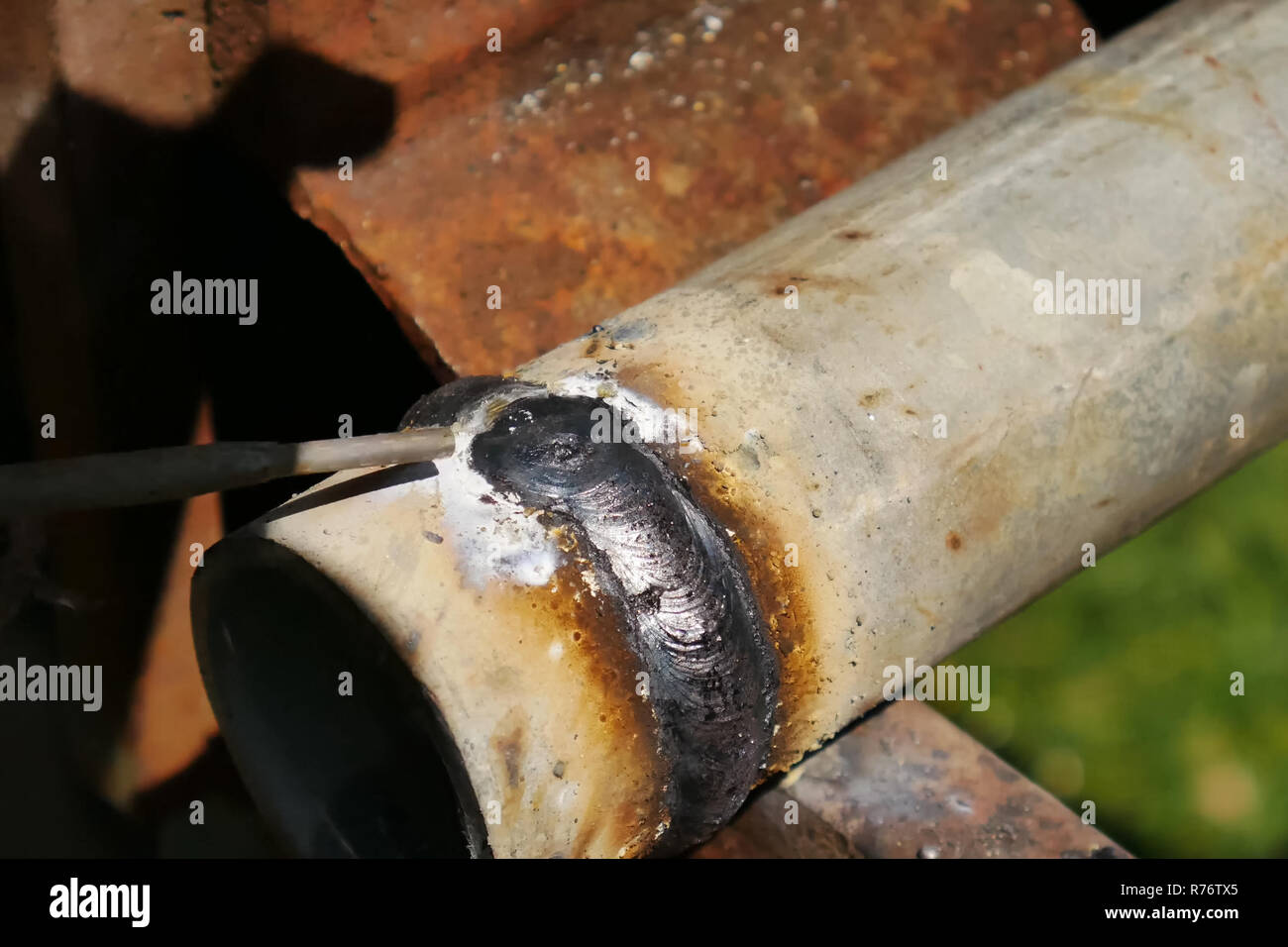 Metal pipe with welded seam. Welding of pipes Stock Photo - Alamy
