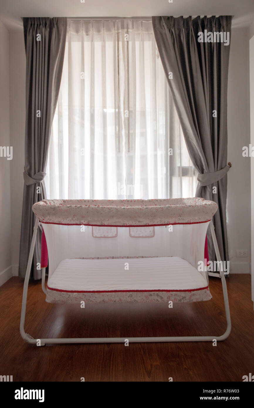 Modern cradle in stylish room Stock Photo - Alamy
