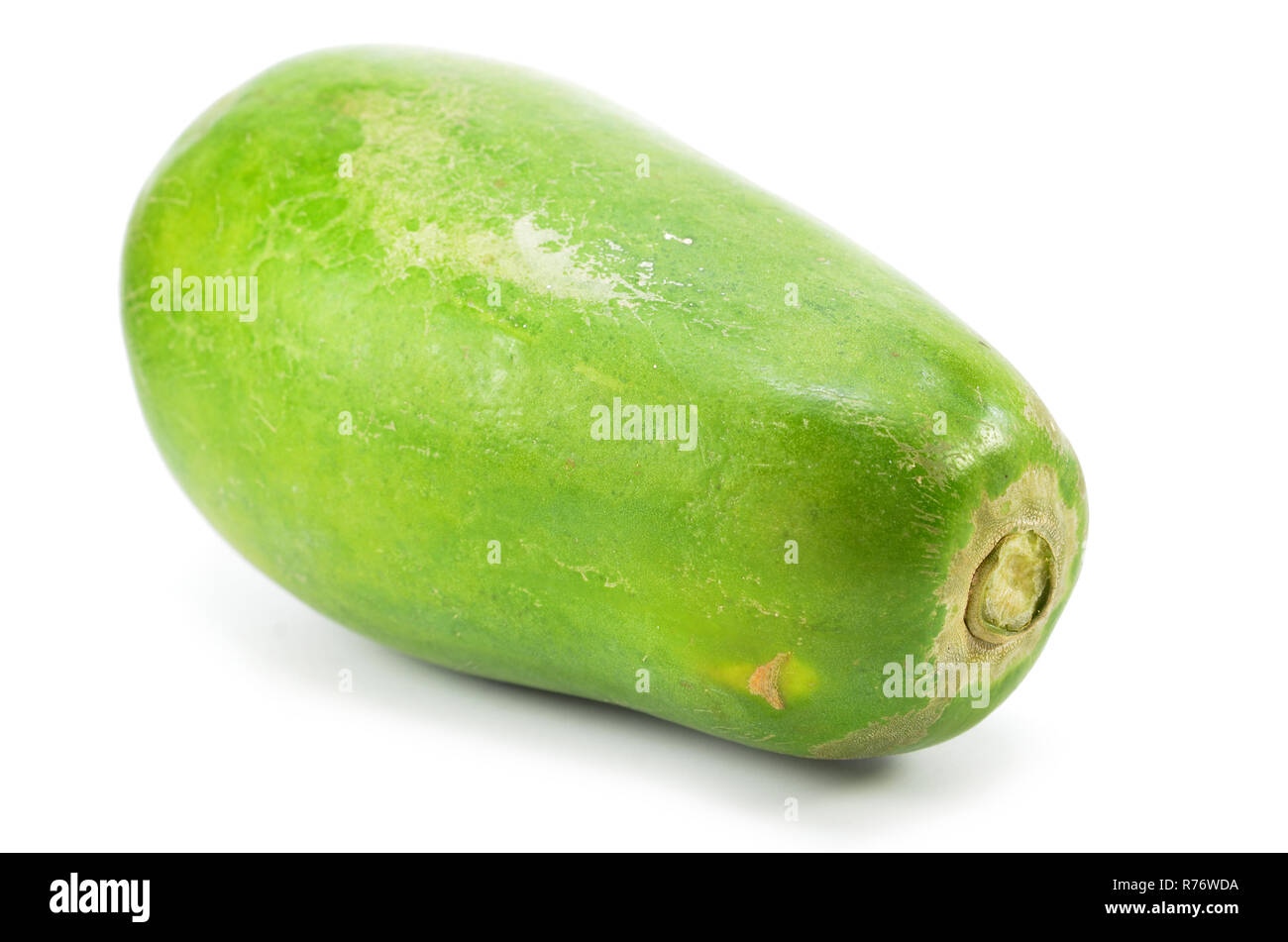Green papaya isolated Stock Photo - Alamy