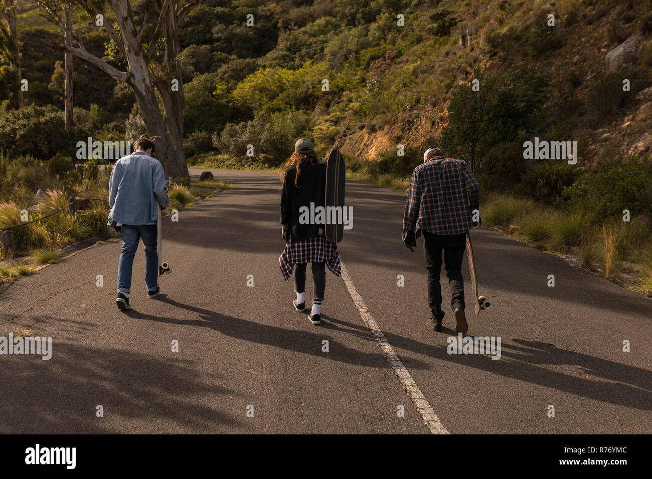 Skateboarder walking hi-res stock photography and images - Alamy