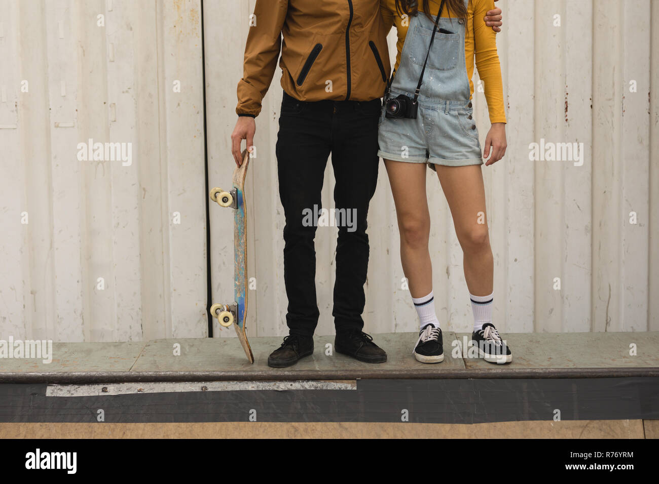 Skateboarders standing on skateboard ramp at skateboard court Stock ...