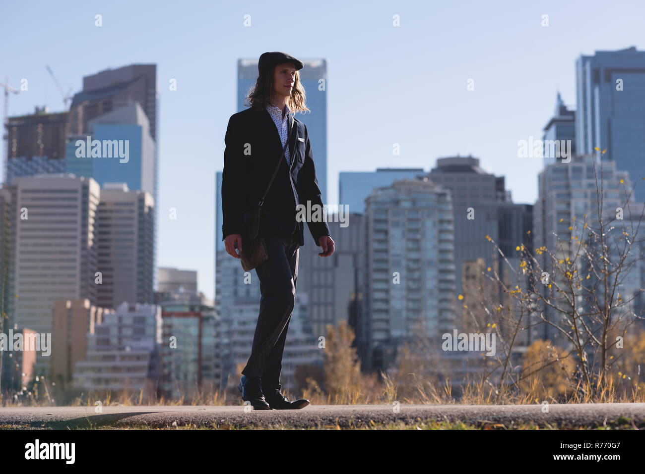 Smart man walking hi-res stock photography and images - Alamy