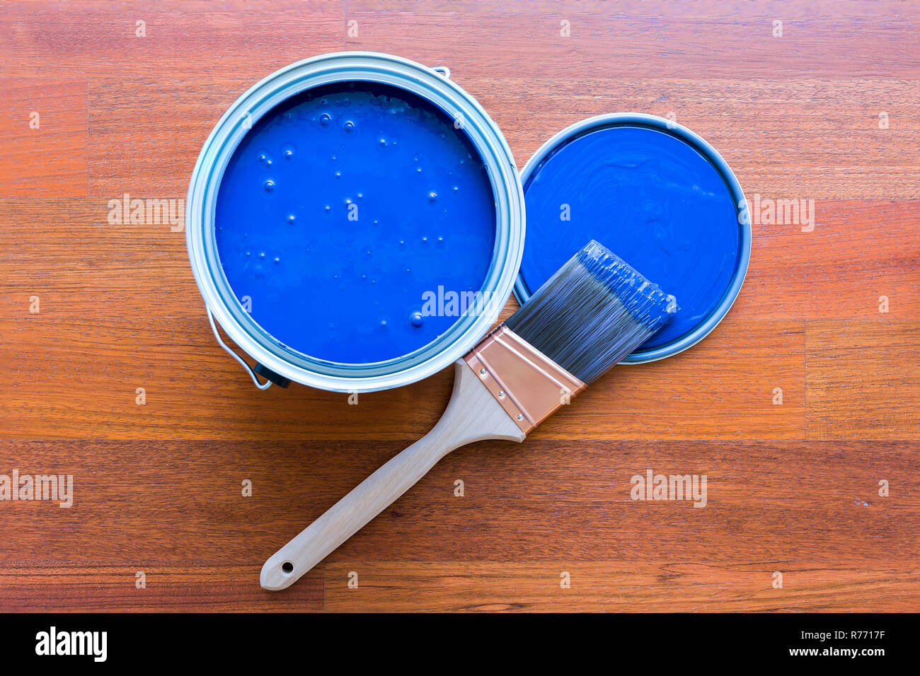 Top View of Blue Paint Can and Brush Stock Photo - Alamy