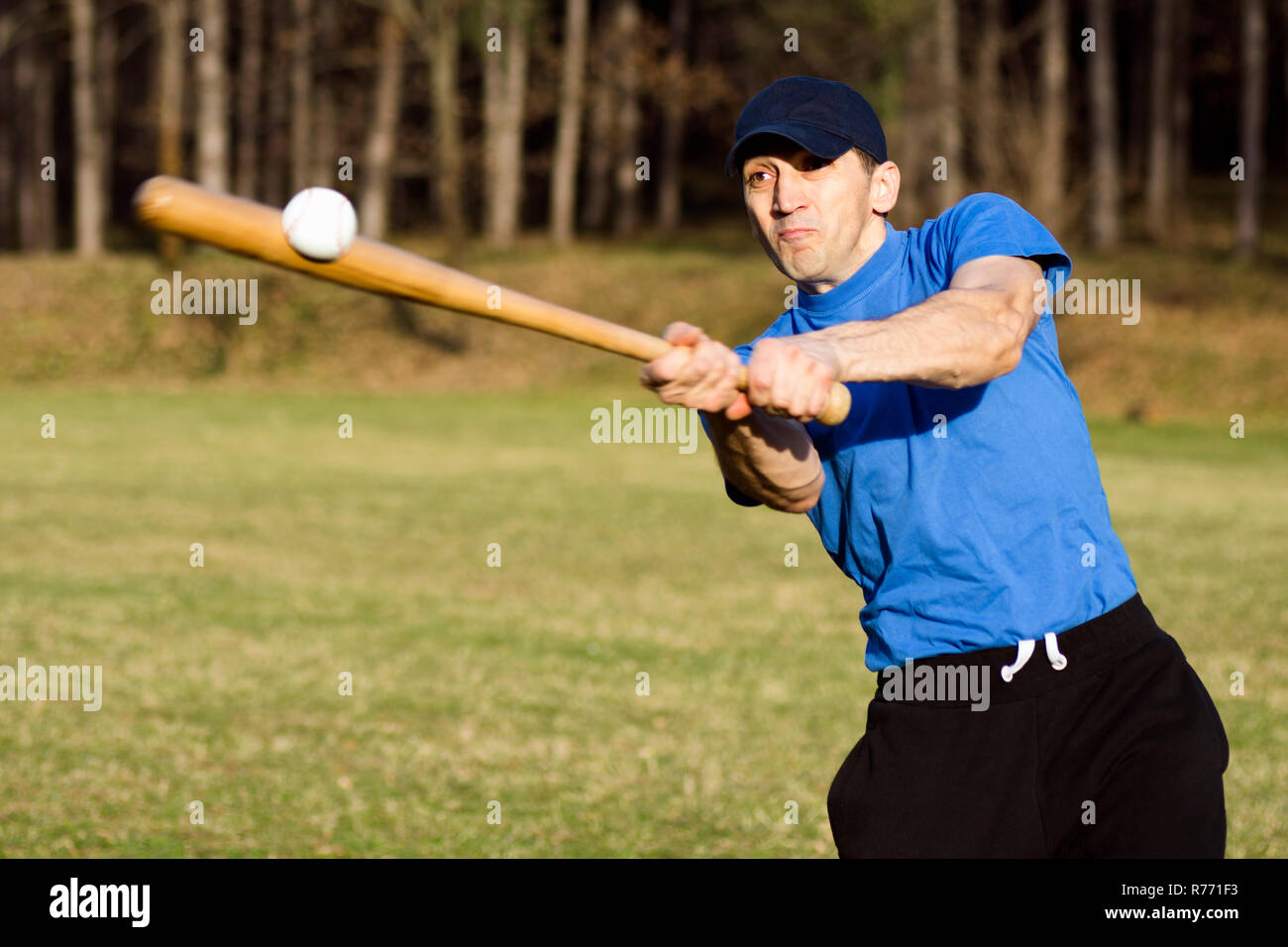 playing baseball player Stock Photo - Alamy