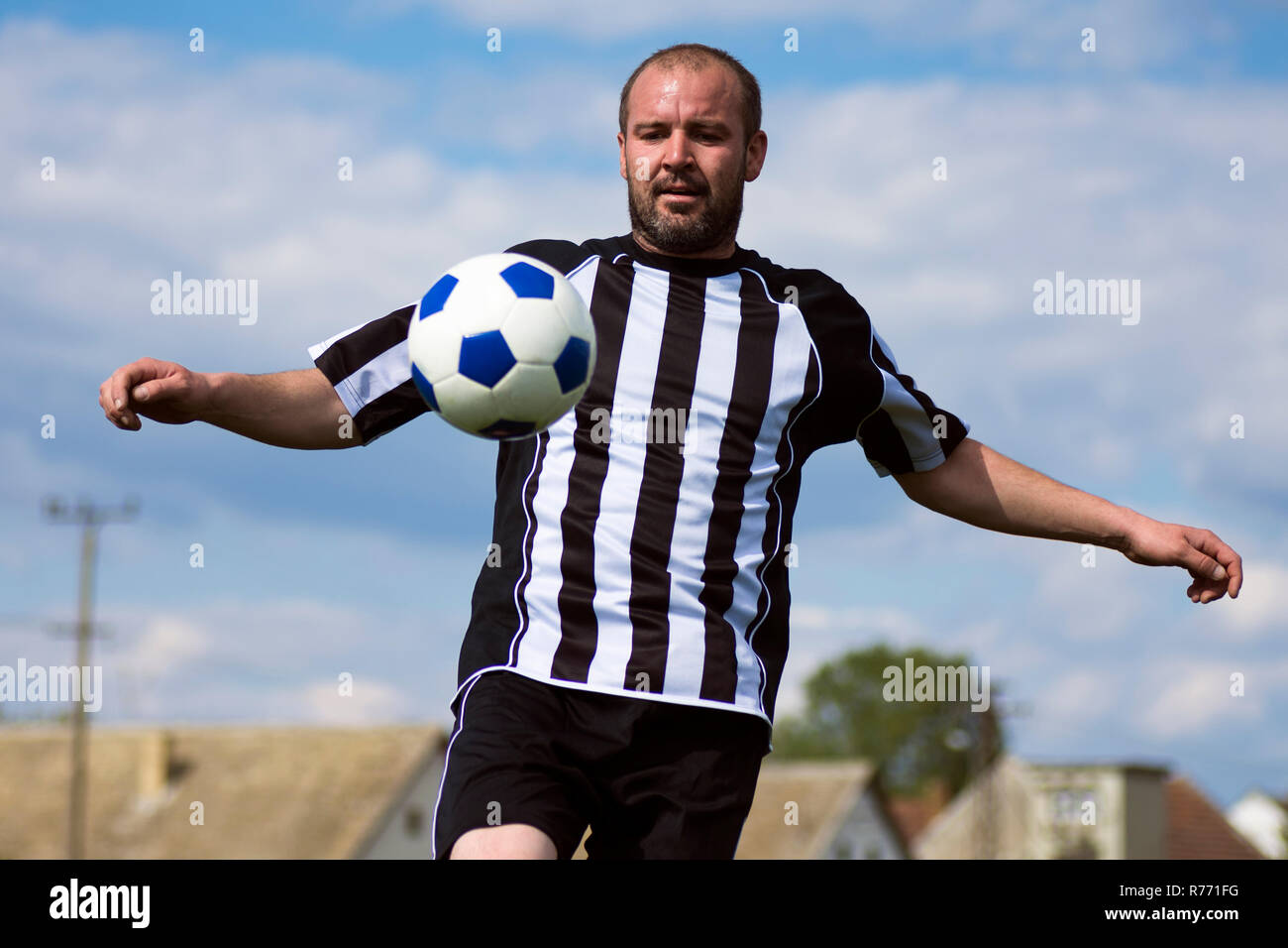soccer player with ball Stock Photo - Alamy