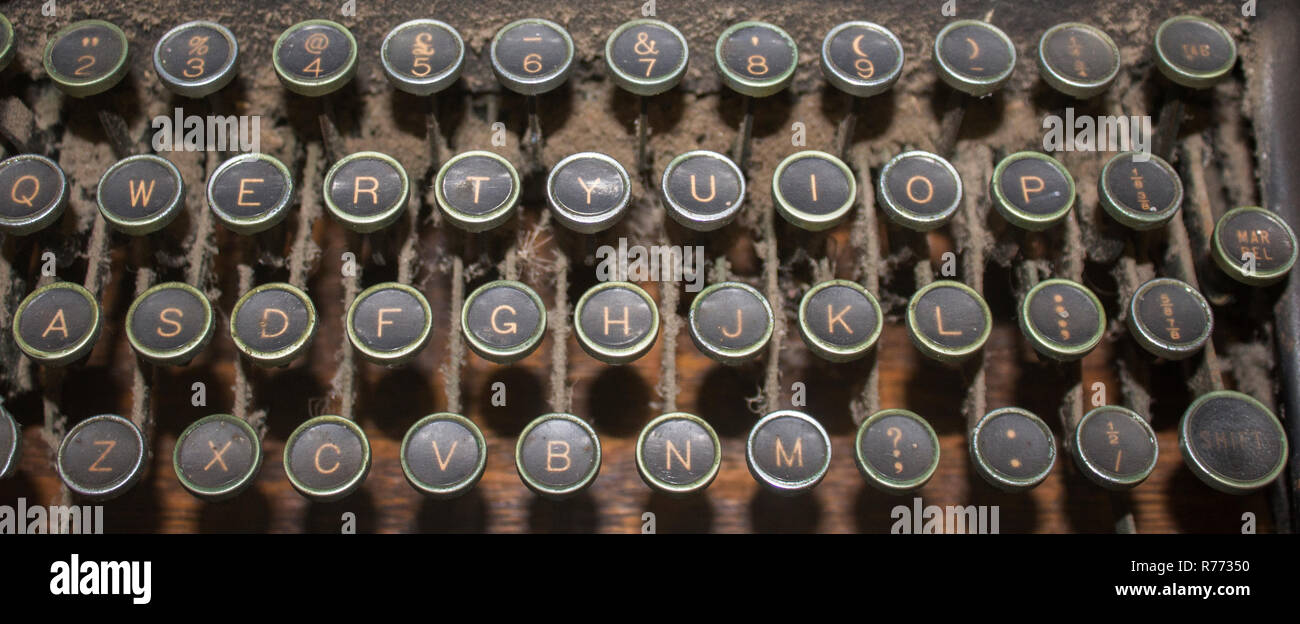 A dusty antique QWERTY typewriter keyboard Stock Photo - Alamy