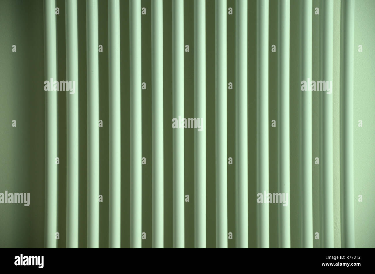 Parallel lines of a metal heating body Stock Photo - Alamy