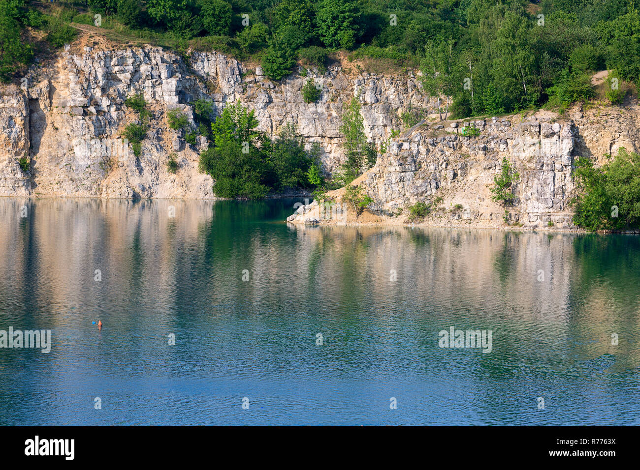 Lagoon Zakrzowek in an old limestone quarry, emerald water, Krakow ...