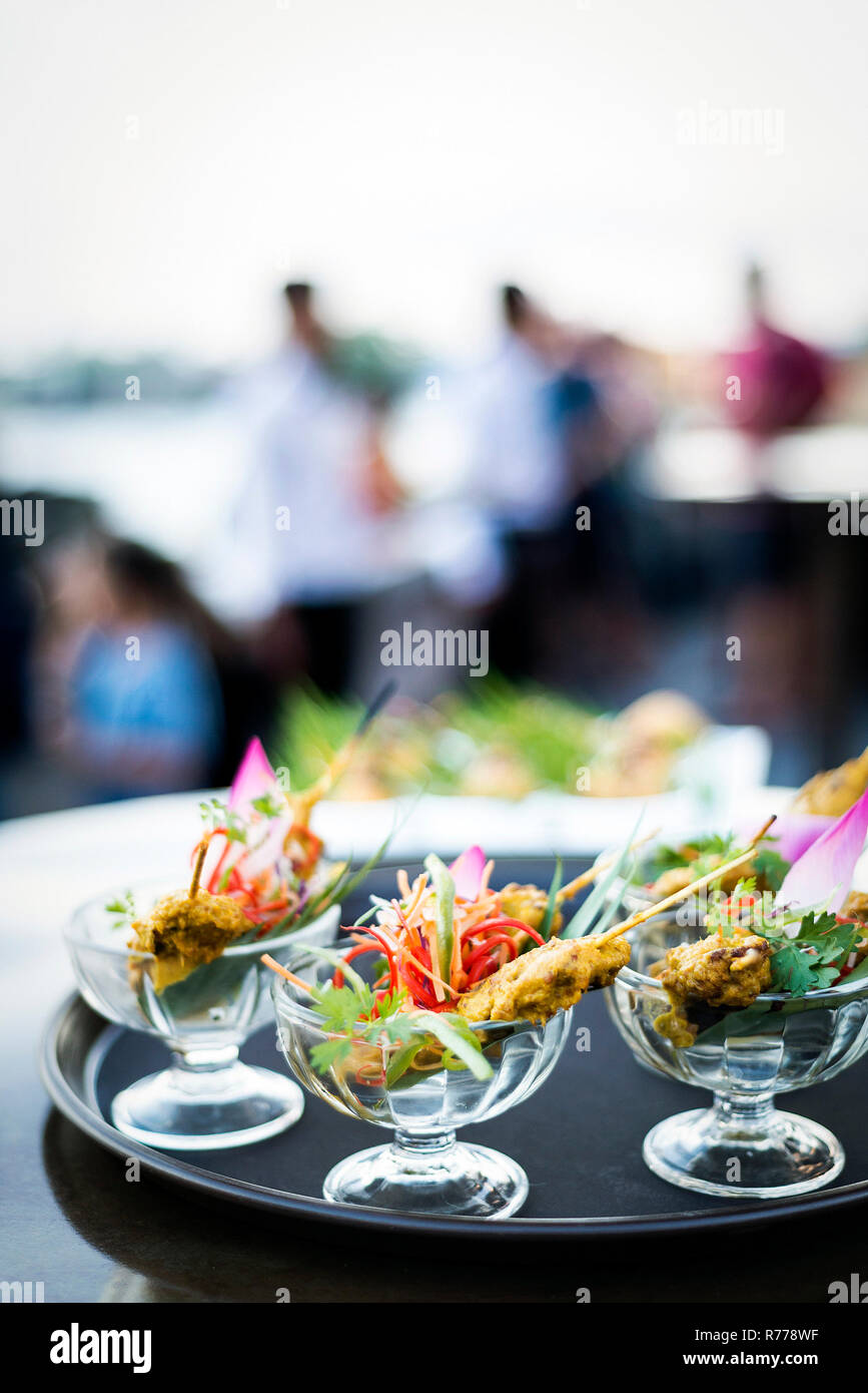 asian chicken satay gourmet snack food in modern outdoor bar Stock ...