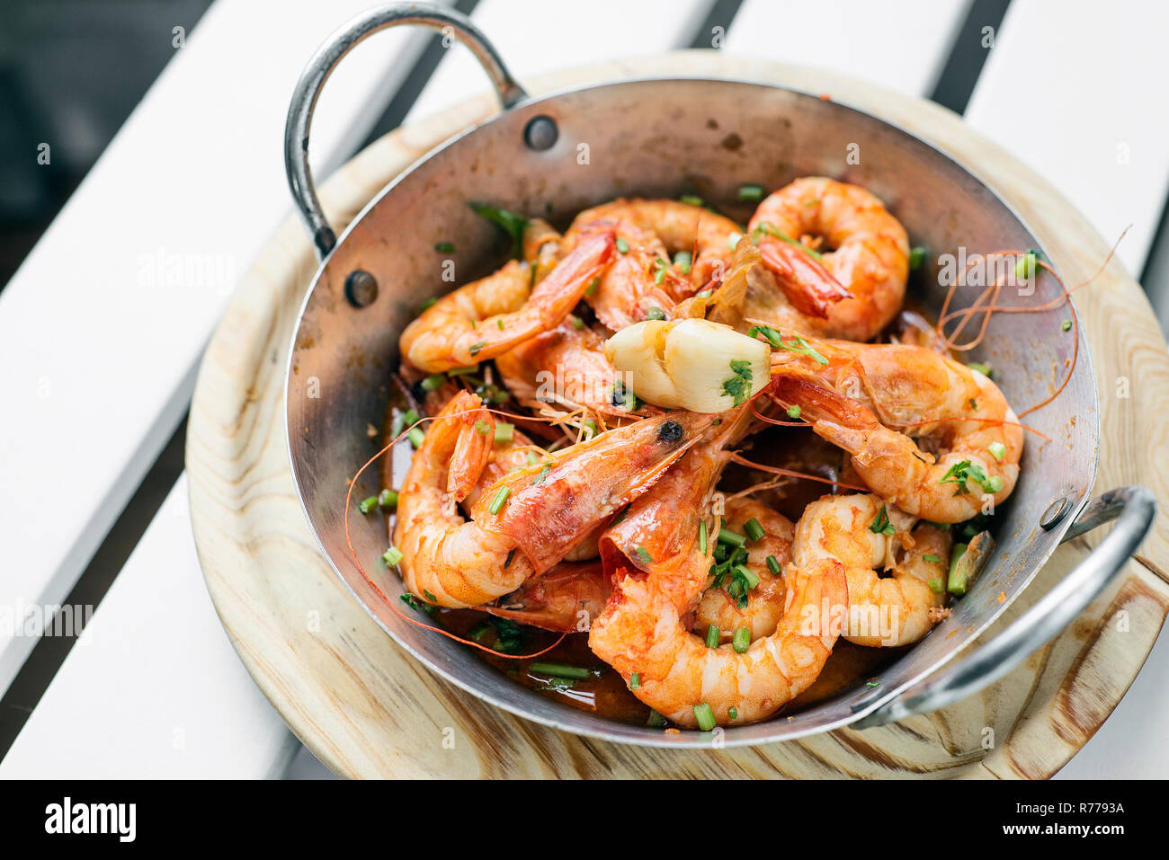 garlic and herb boiled fresh prawns tapas snack set Stock Photo - Alamy
